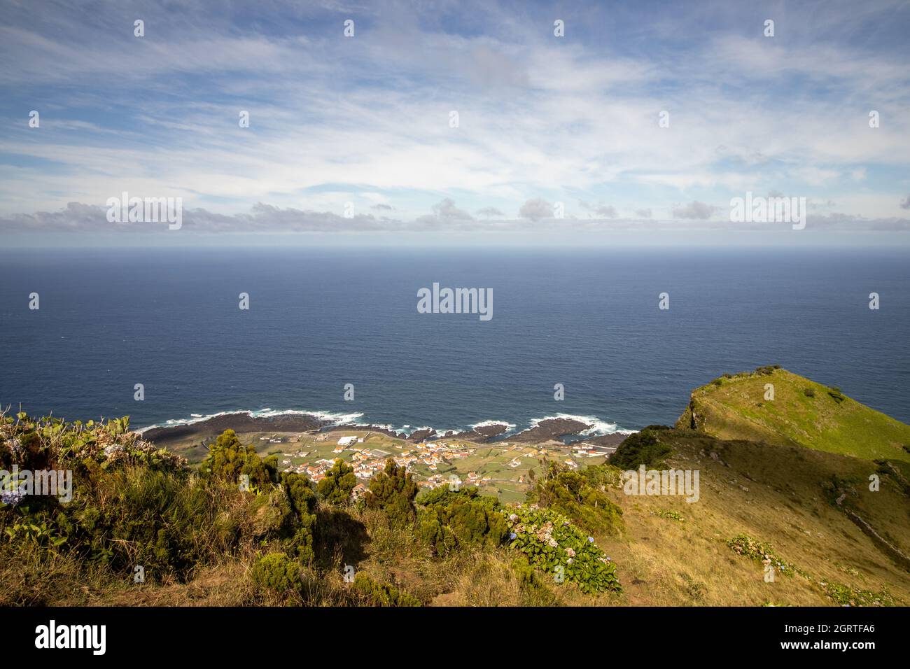 Azores islands, landscape with hiker in green vegetation, Flores ...