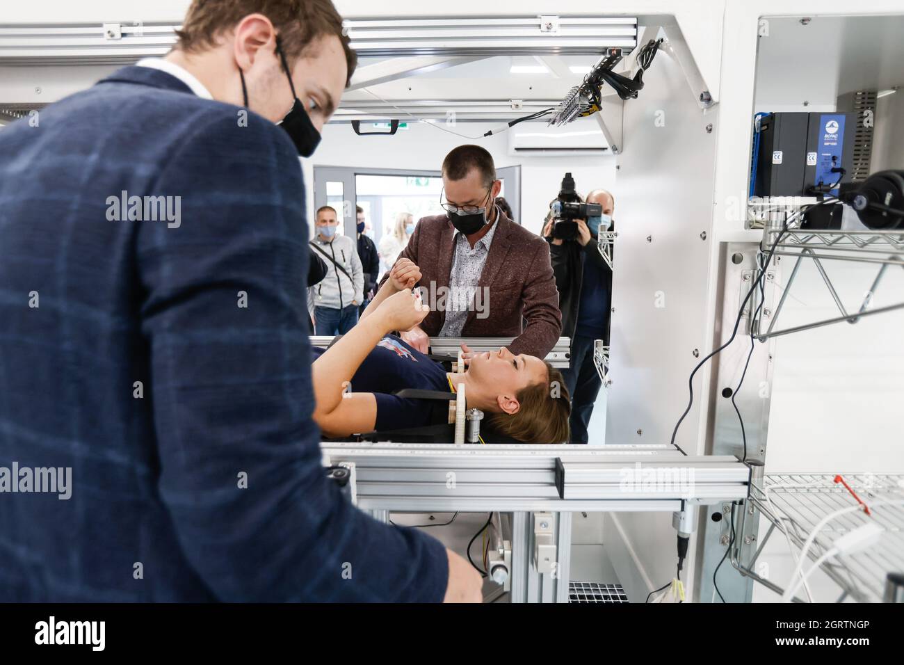 A volunteer is being prepared for a test on the shorthand human ...