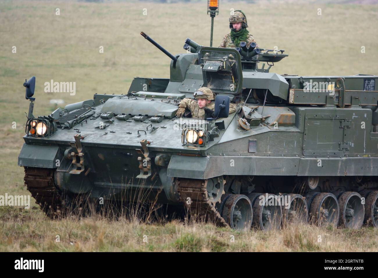 British army Warrior FV512 mechanized recovery vehicle REME in action ...