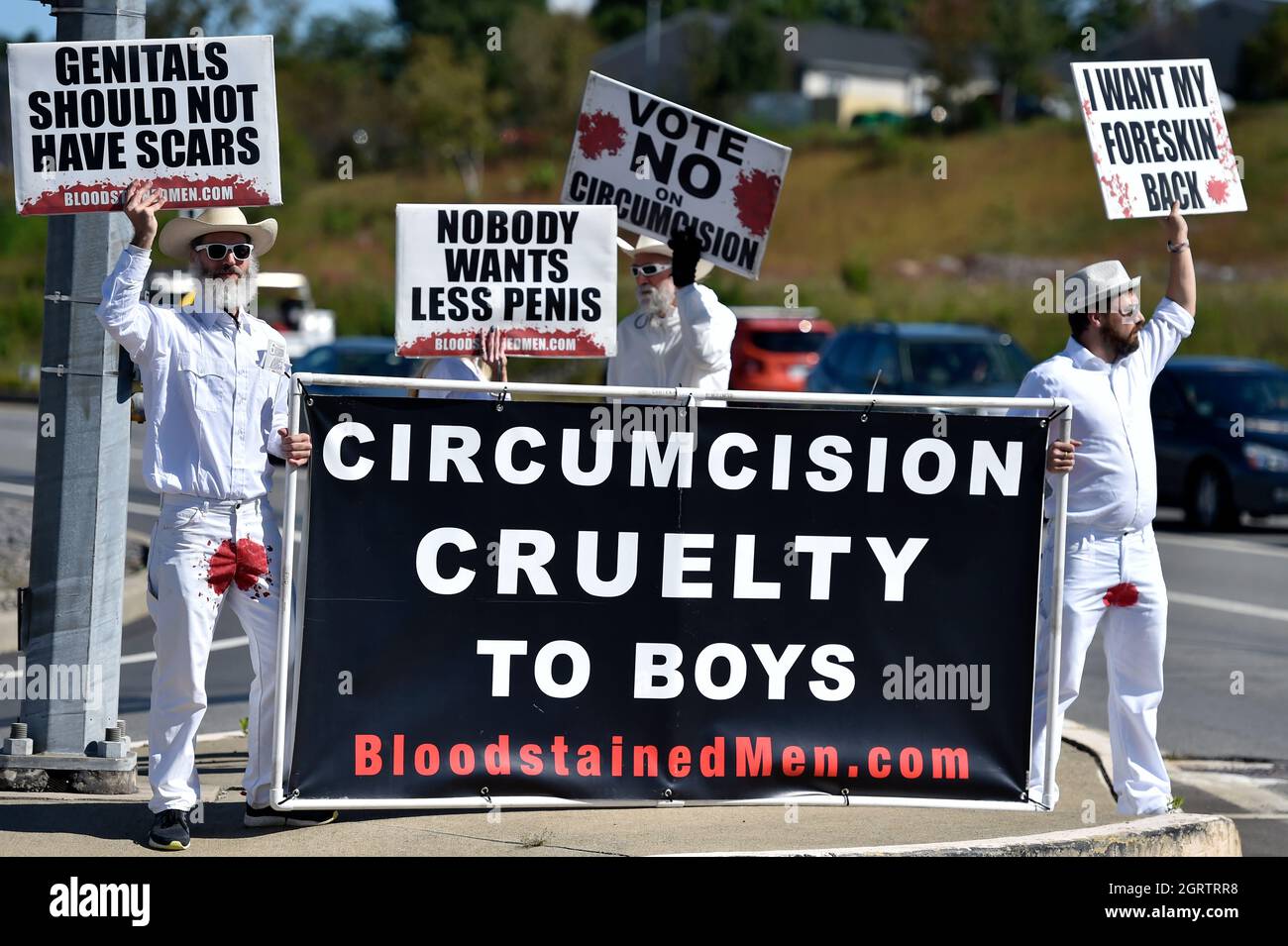 Wilkes Barre, USA. 01st Oct, 2021. Bloodstained protesters hold a huge ...