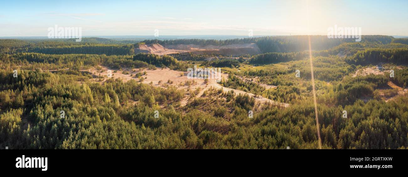 Scenic landscape with forest and abandoned and recultivated quarry ...