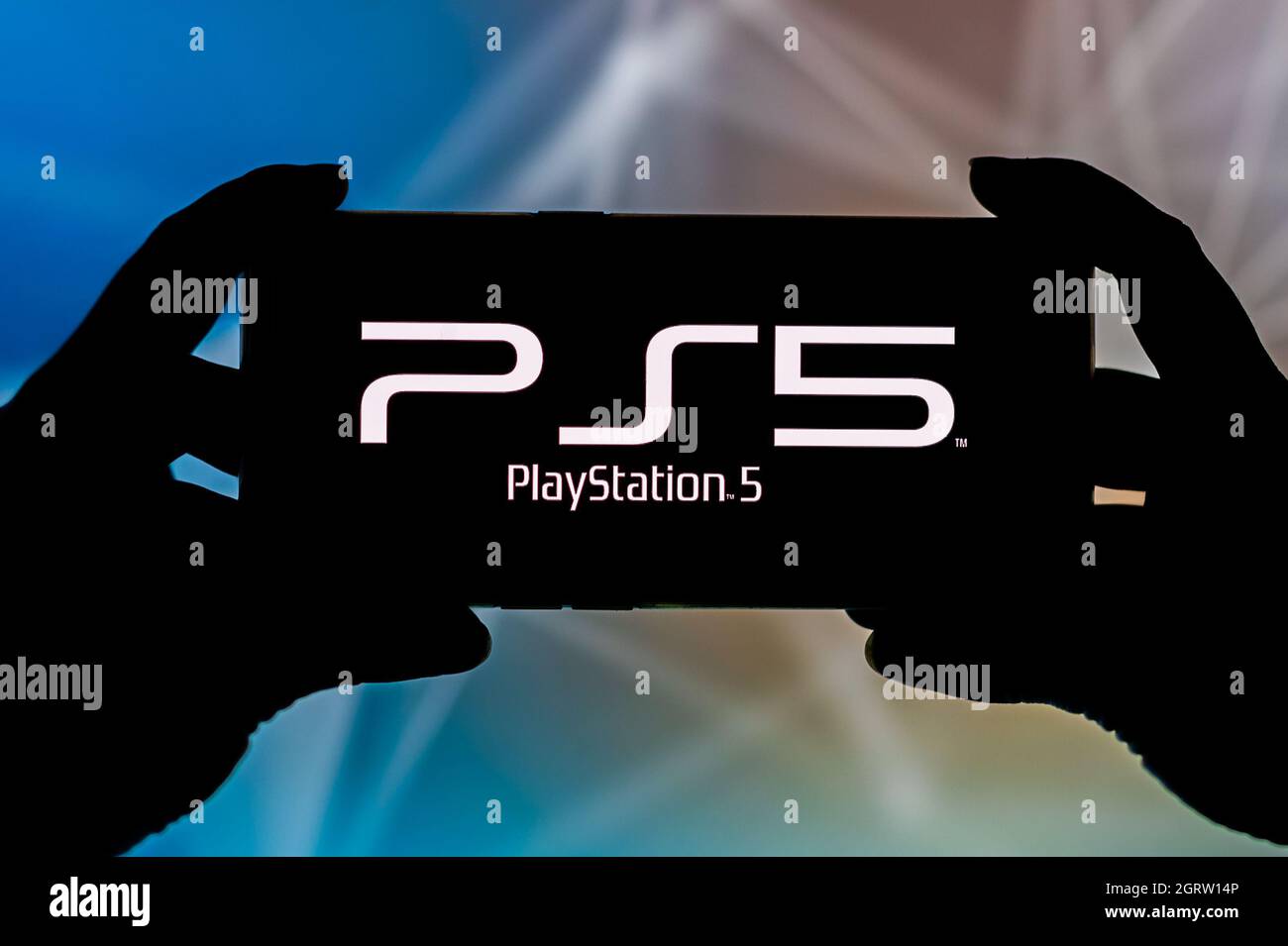In this photo illustration a PlayStation 5 logo seen displayed on a ...