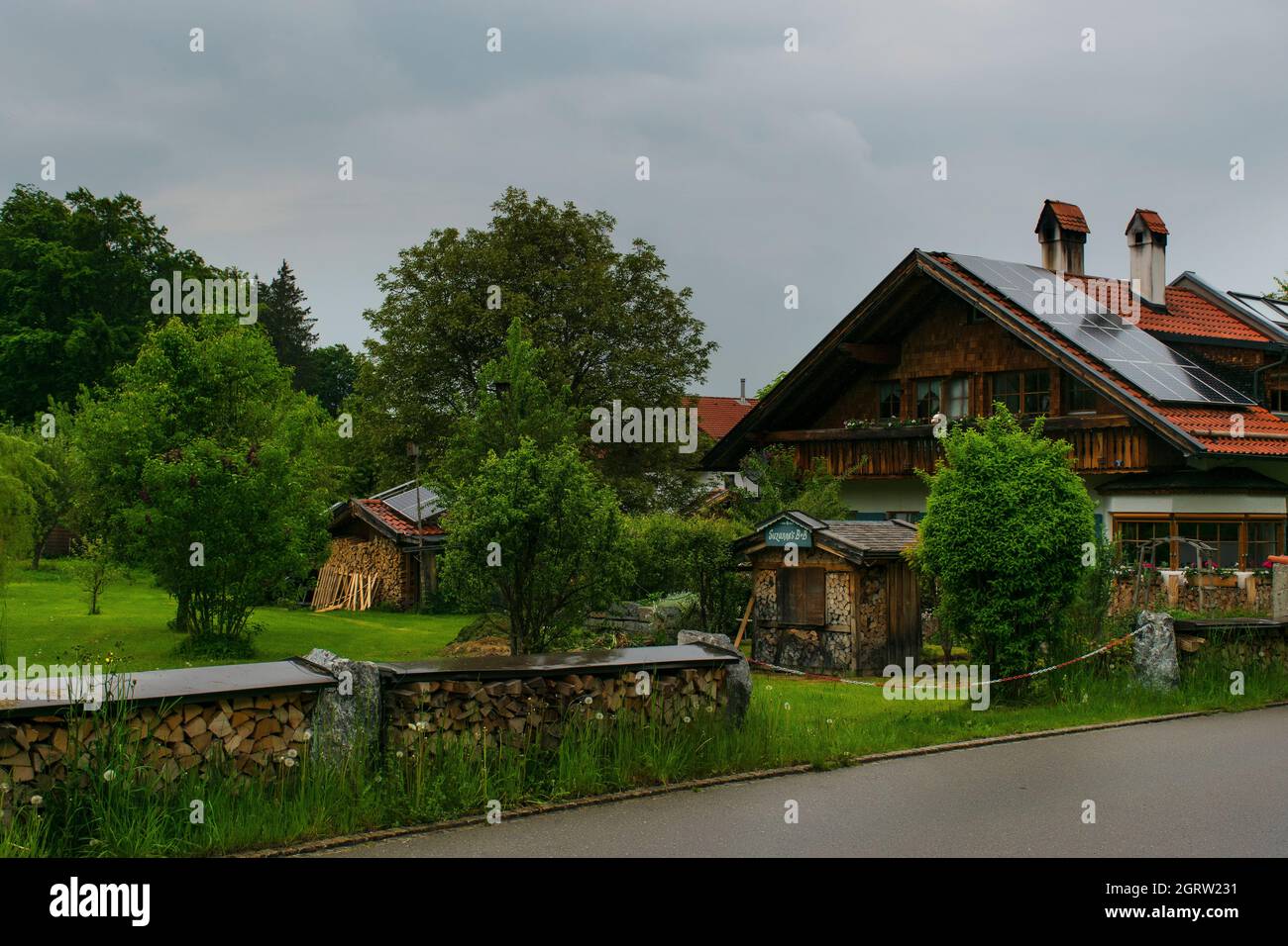 Füssen, Germany 27 May 2019 - Cozy alpine houses with wooden roofs lost ...