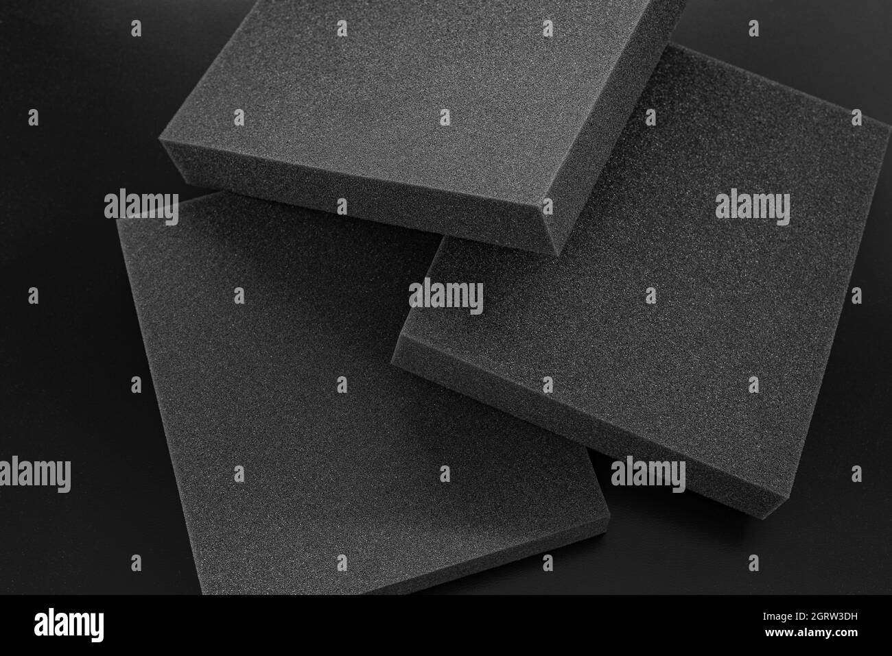 Abstract composition of foam pieces against dark background Stock Photo ...