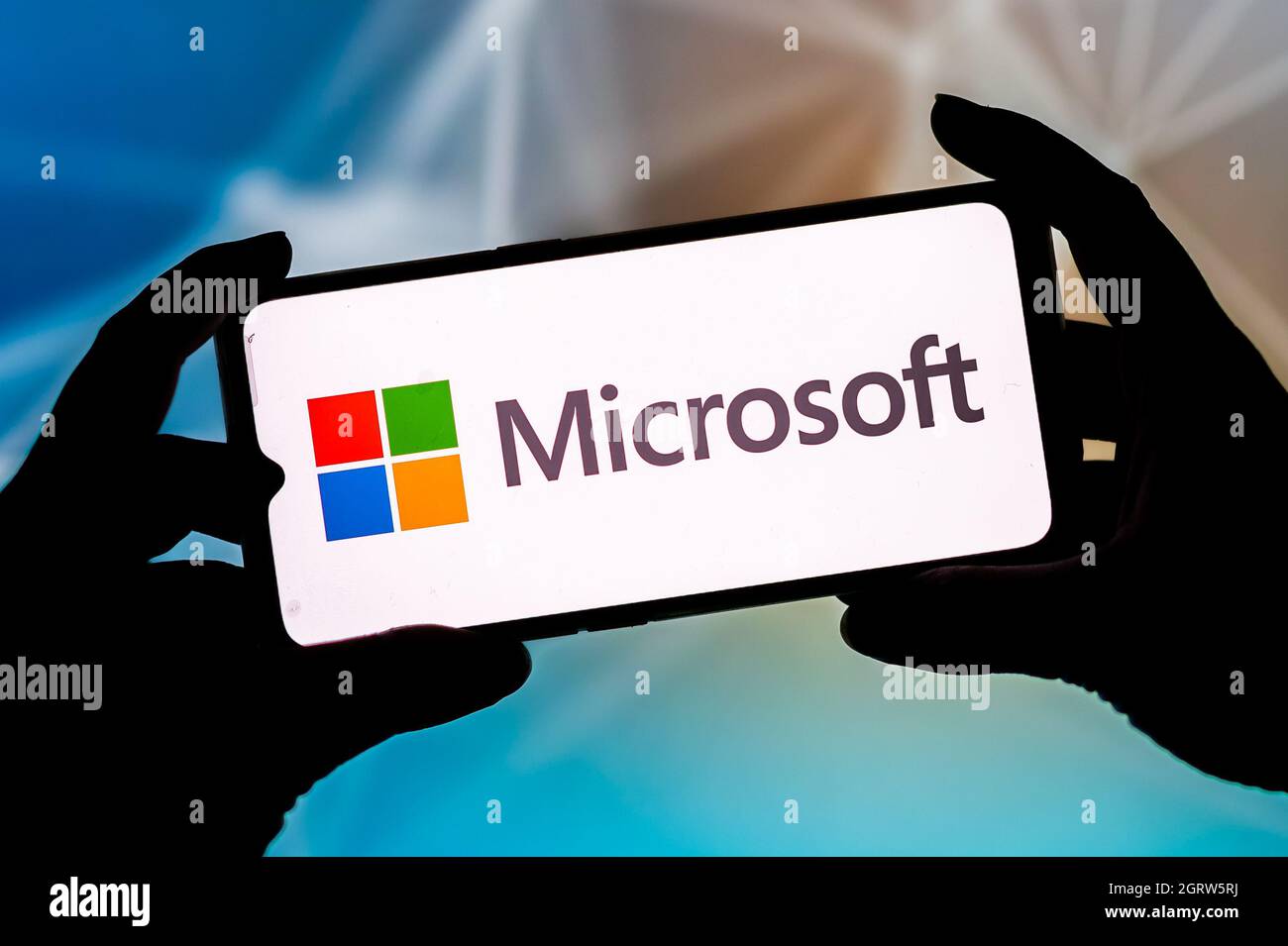 In this photo illustration a Microsoft logo seen displayed on a ...
