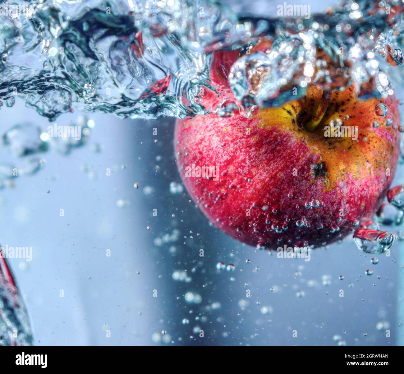 High speed photography and apple hi-res stock photography and images ...