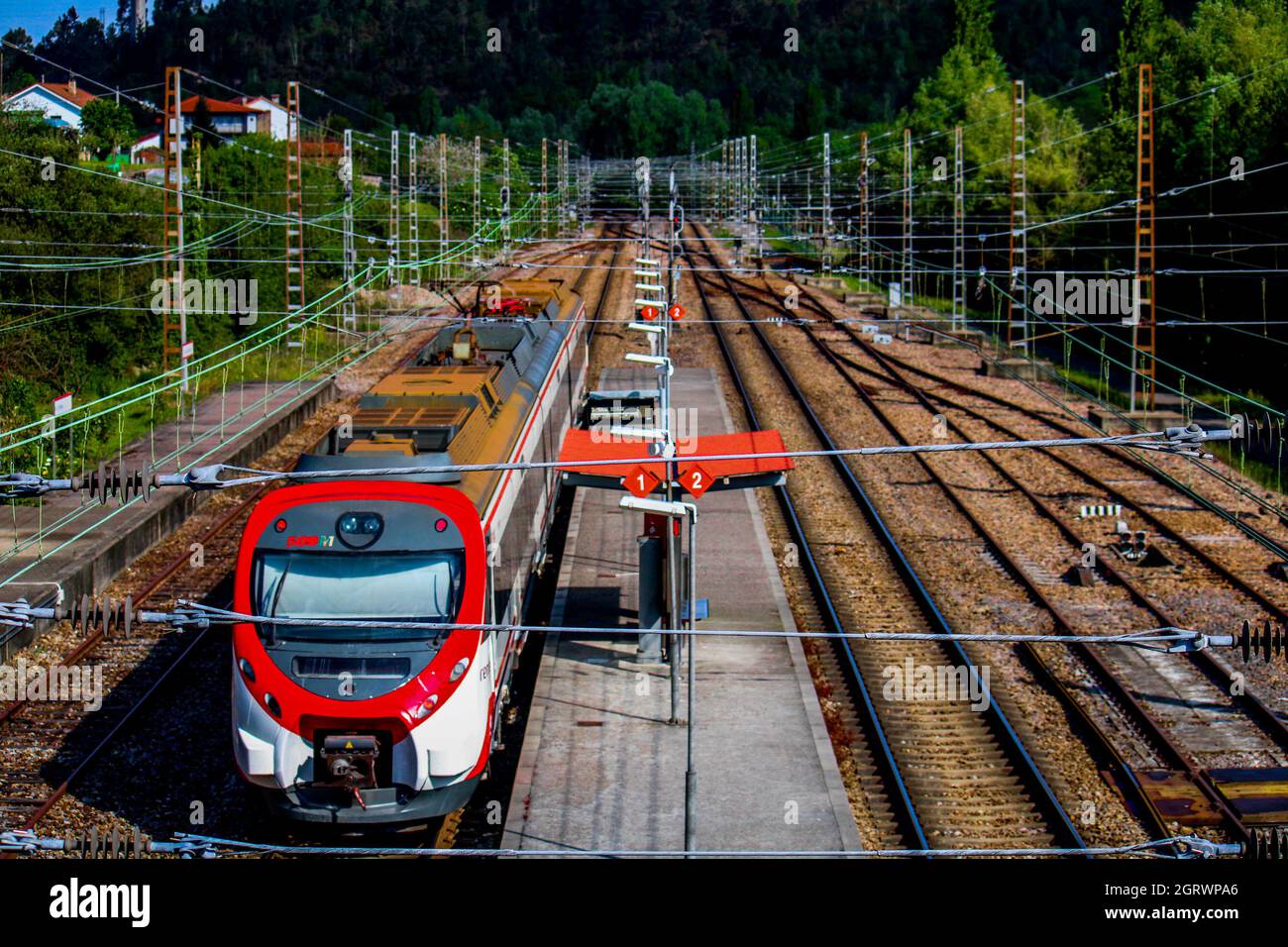 Train in a station on a sunny morning Stock Photo - Alamy