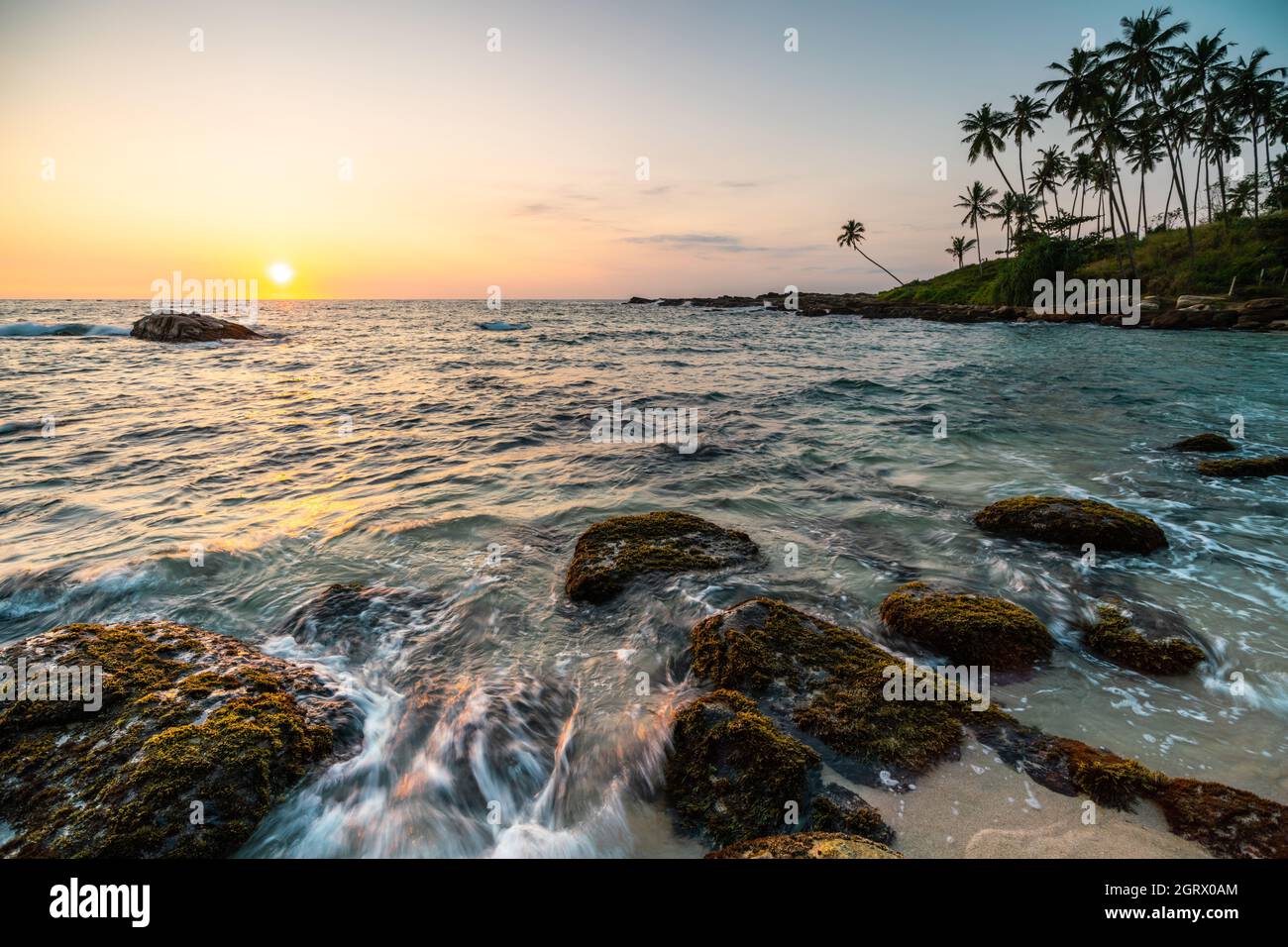 Beautiful sunset at beach in Sri Lanka Stock Photo - Alamy