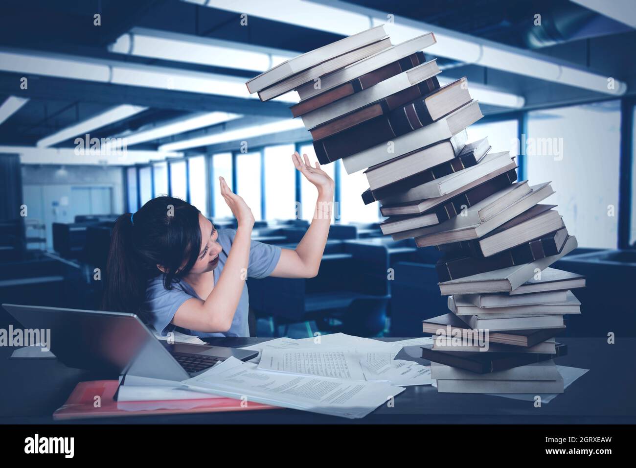 Chair stack falling hi-res stock photography and images - Alamy