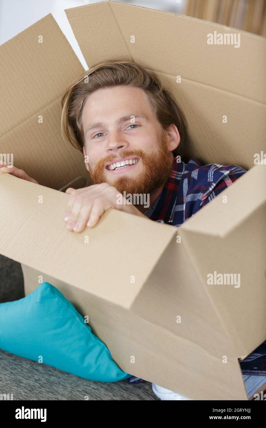 happy man with box instead of his head Stock Photo - Alamy