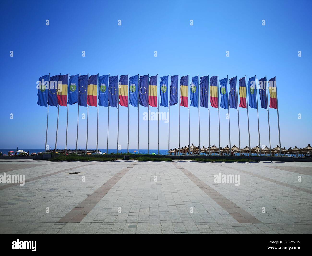 Row flagpoles flags eu hi-res stock photography and images - Alamy