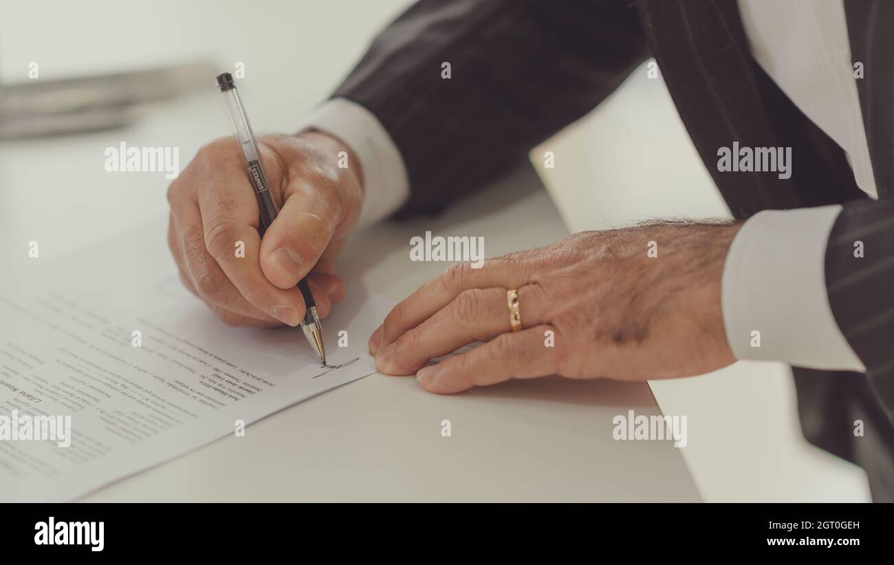 Signing body part hi-res stock photography and images - Alamy