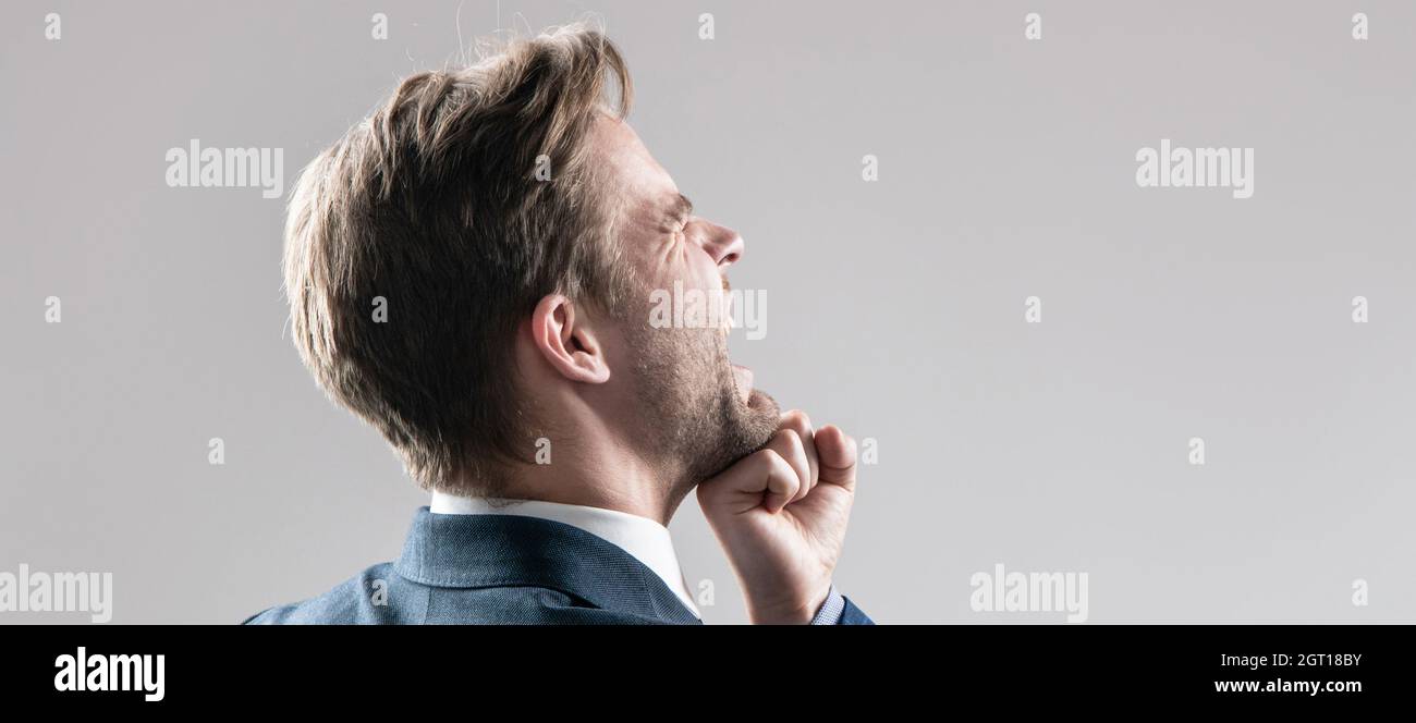 Professional man employee got punch in face with fist grey background ...