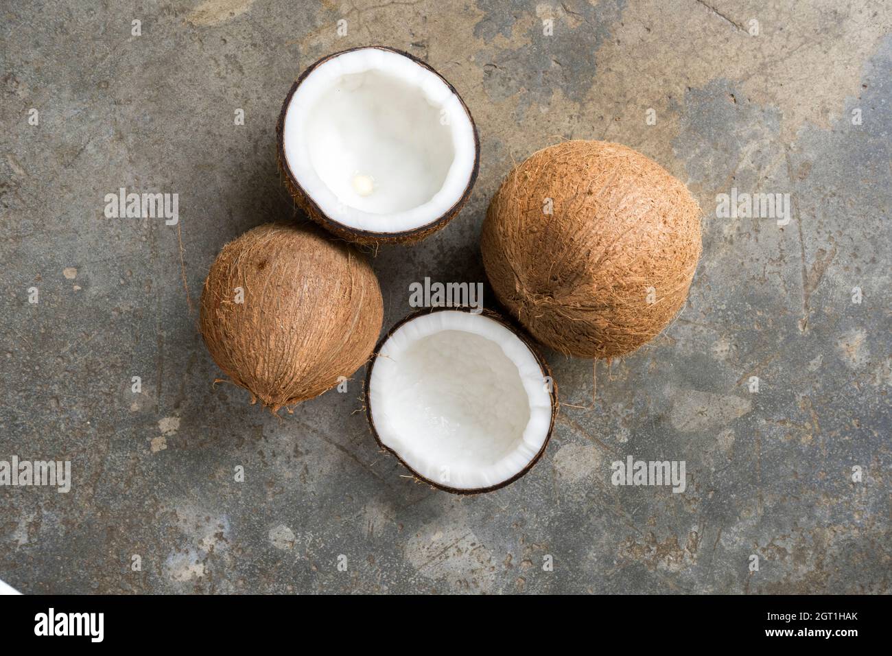 Coconut Was Piled On A Concrete For Coconut Milk Stock Photo - Alamy
