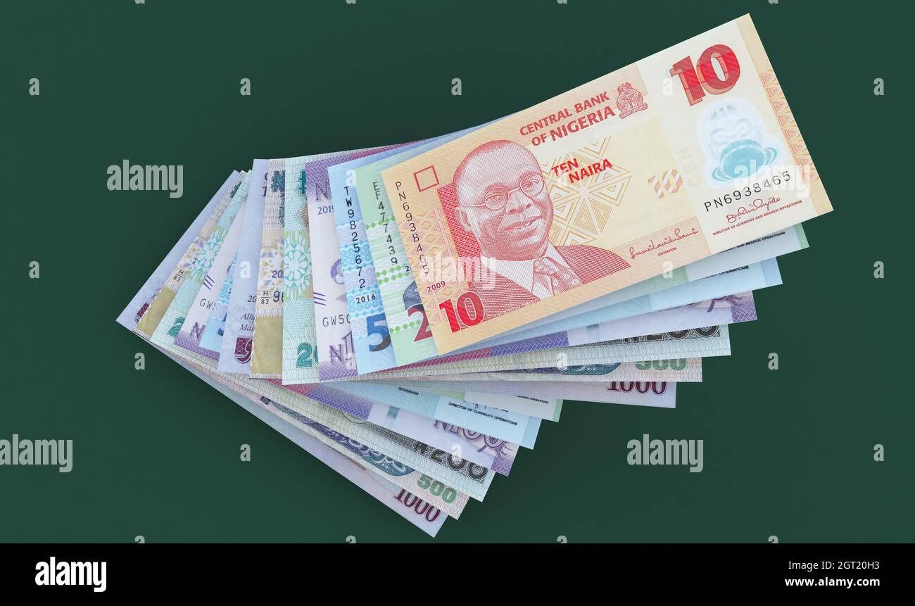 All denominations of Nigerian naira note on green plain background ...