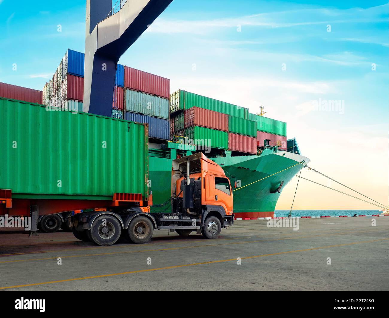 Cargo ship discharging containers High Resolution Stock Photography and ...