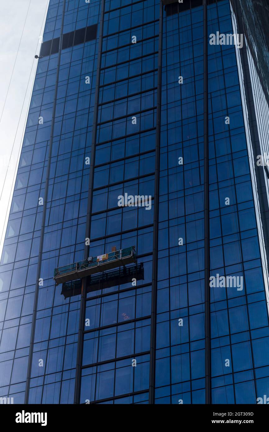 External glass cleaning of a modern building Stock Photo - Alamy