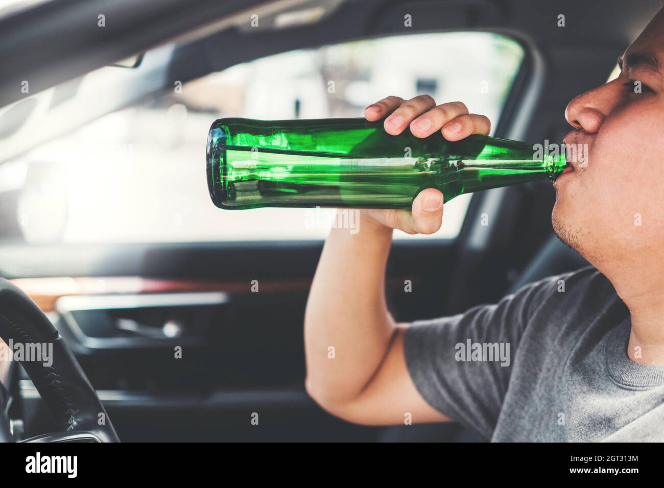 Man Drinking Beer In Car Stock Photo - Alamy