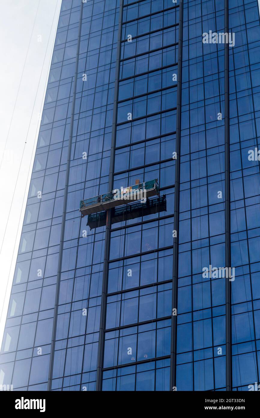 External glass cleaning of a modern building Stock Photo - Alamy