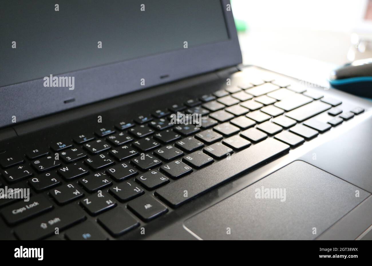 The Keyboard Of A Notebook On The Desk Stock Photo - Alamy