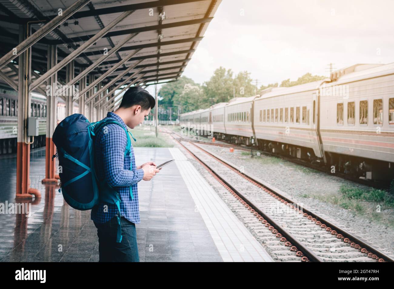 Indian man on railway platform hi-res stock photography and images - Alamy