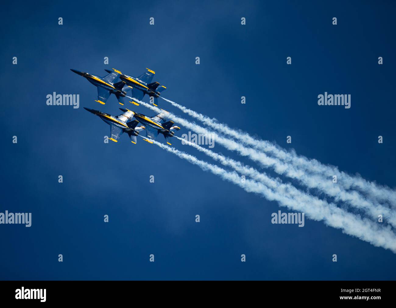 The U.S. Navy Blue Angels perform a Diamond 360 maneuver while ...