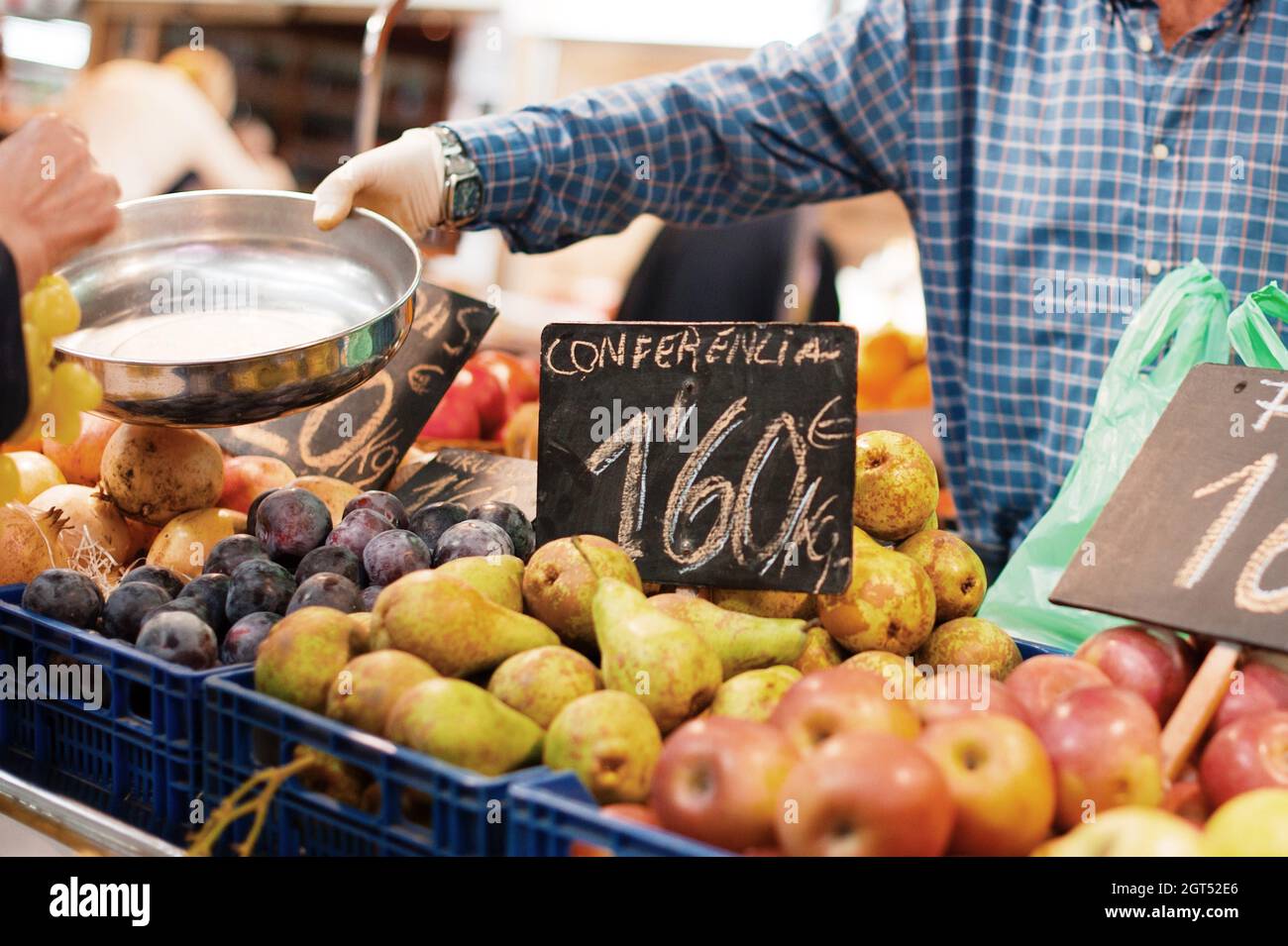 Person buying fruits with price tag hi-res stock photography and images ...