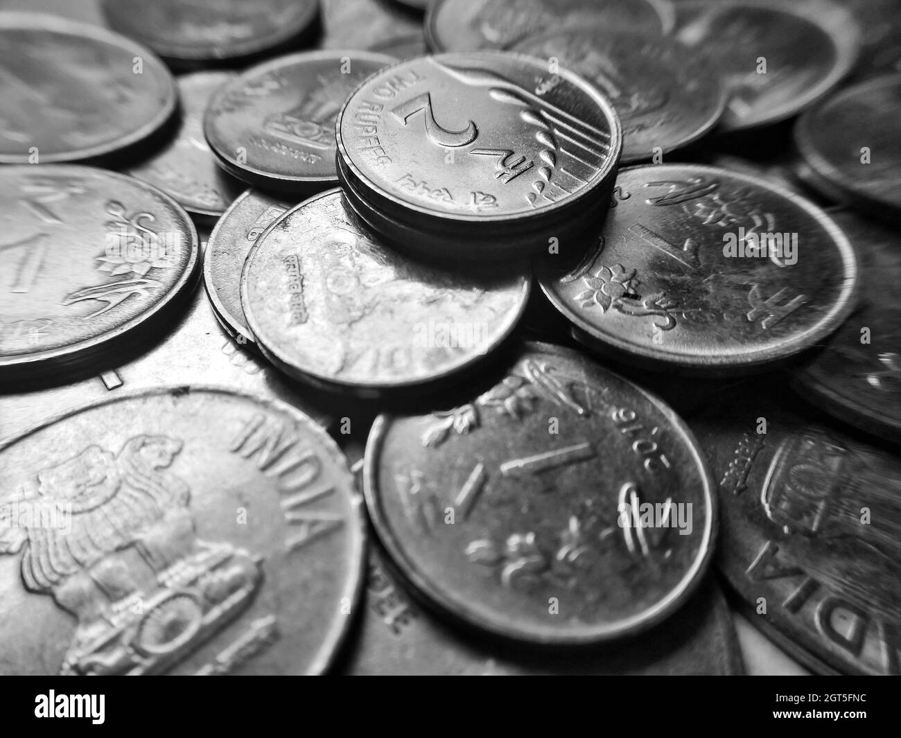Stack Of Indian Coins Black and White Stock Photos & Images - Alamy