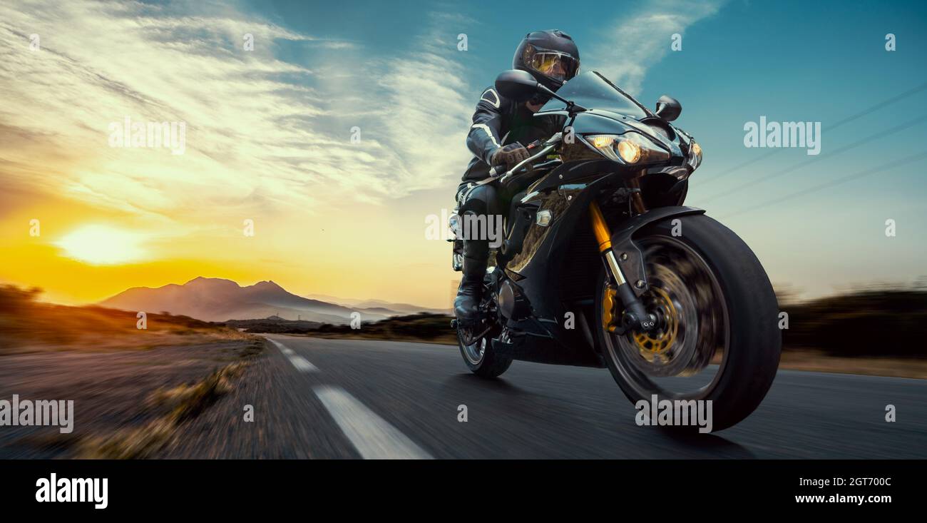 Biker riding motorcycle low angle hi-res stock photography and images ...