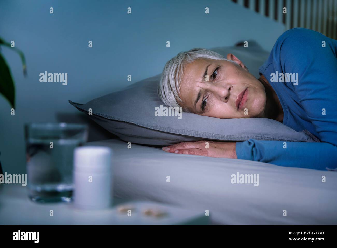 Women awake bed hi-res stock photography and images - Alamy