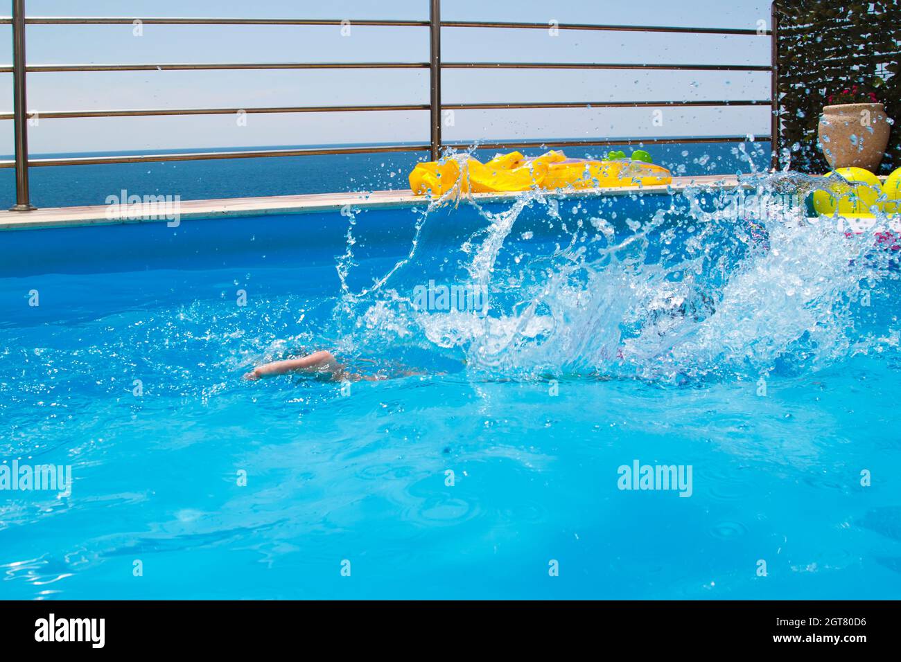 Water Splashing In Swimming Pool Stock Photo - Alamy