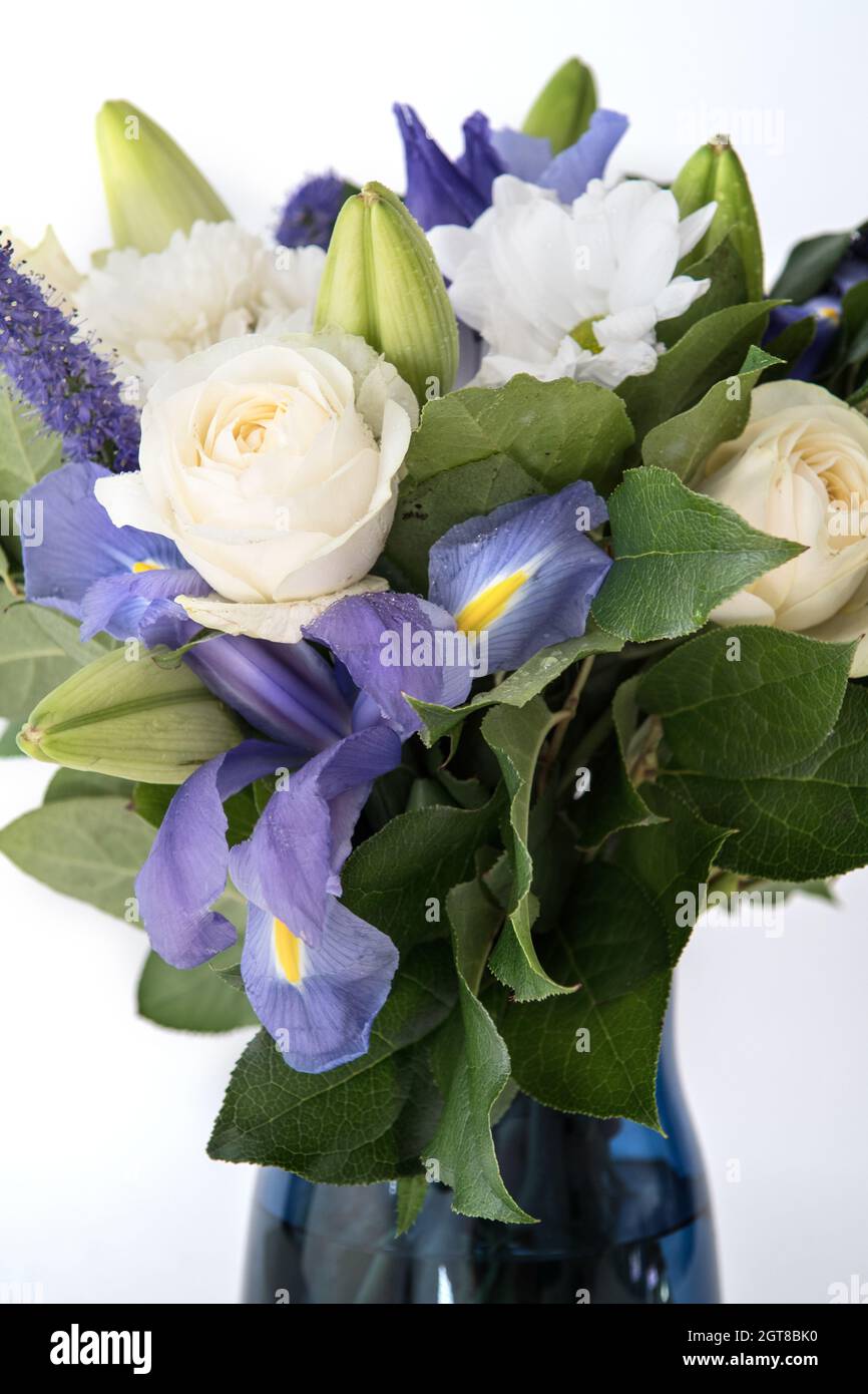 Funeral Bouquet purple White flowers, Sympathy and Condolence Concept ...