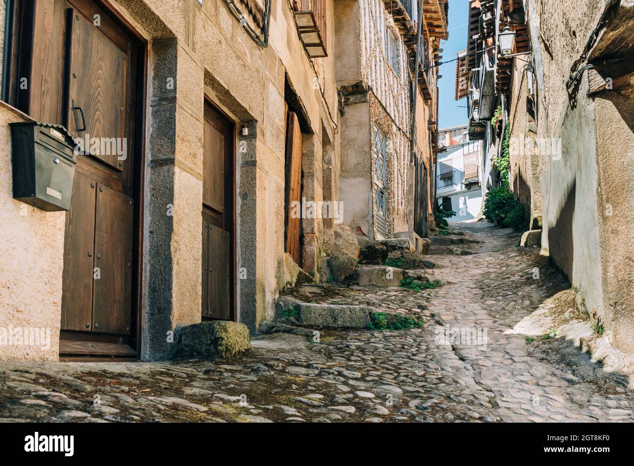 Narrow Alley Amidst Old Buildings In Town Stock Photo - Alamy