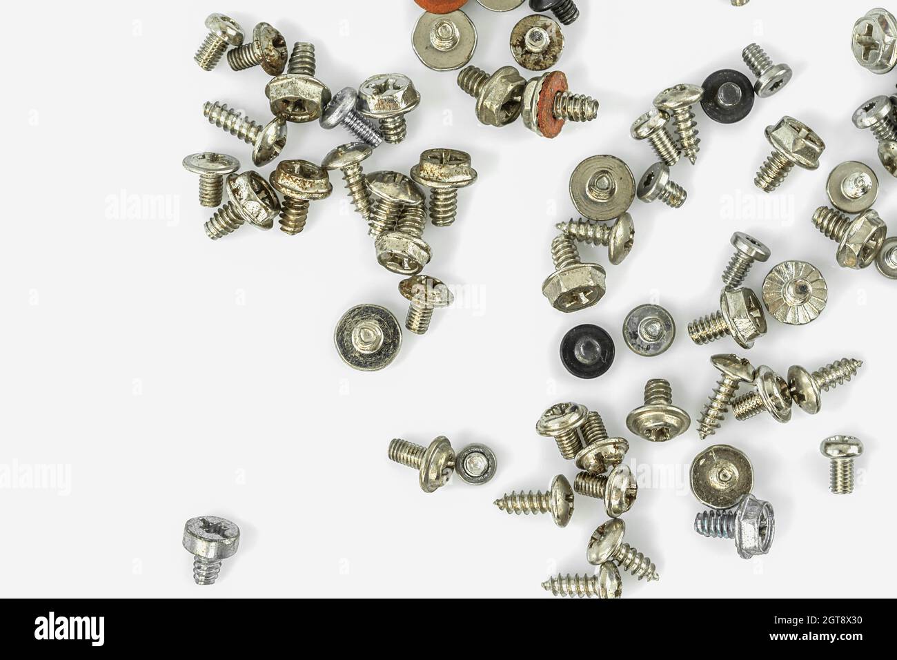 Set Of Old Screws On The White Background Stock Photo - Alamy