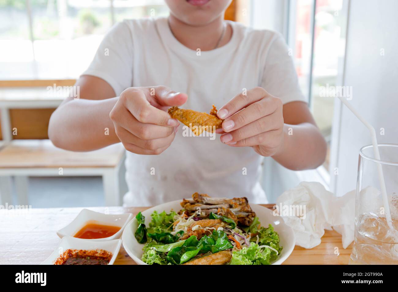 Boy chicken sandwich hi-res stock photography and images - Alamy