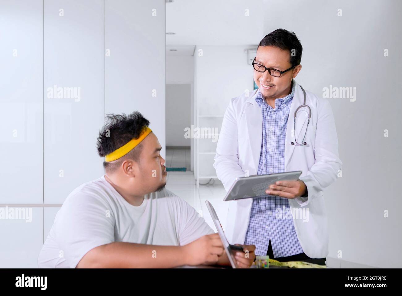 Overweight patient with doctor hi-res stock photography and images - Alamy