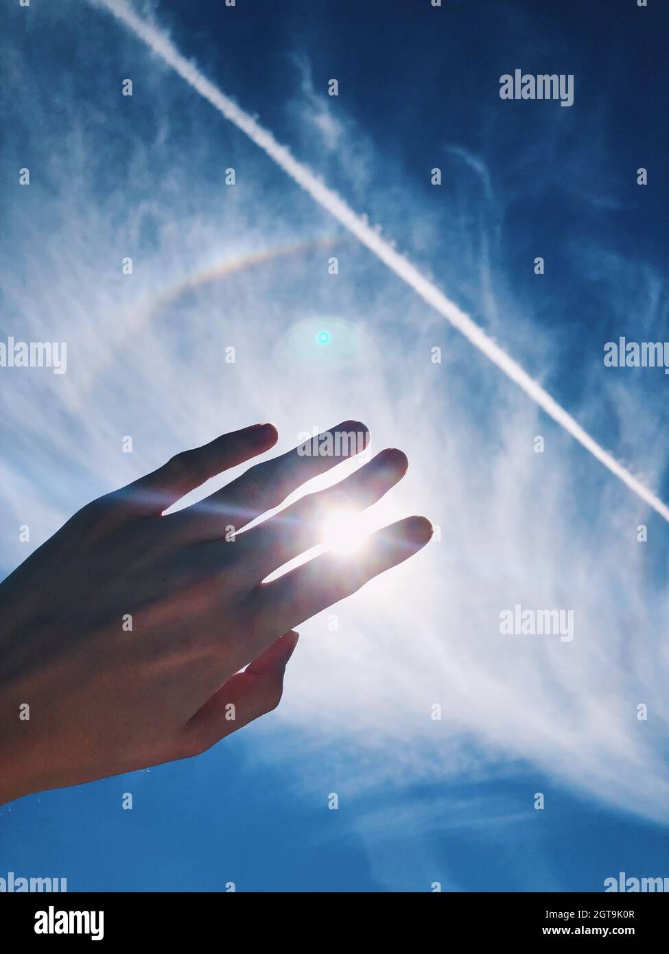 Hand blocking sunlight blocking hi-res stock photography and images - Alamy