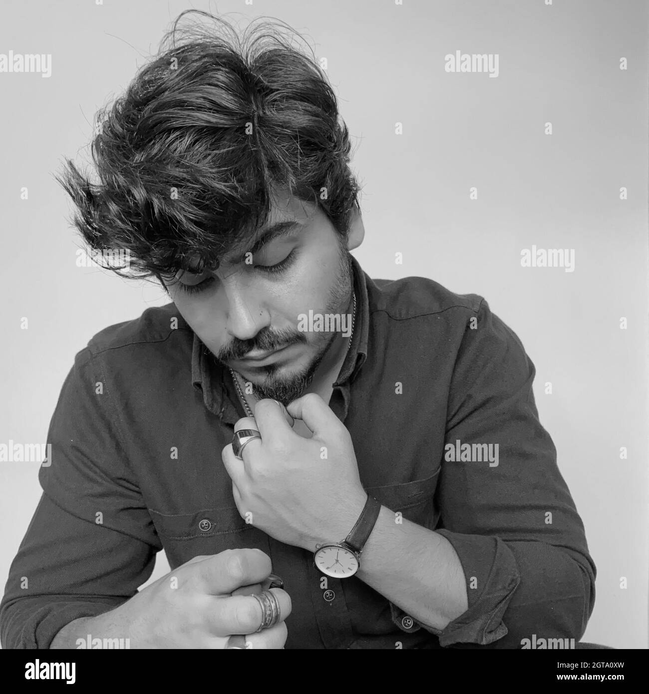Man sitting down black and white hi-res stock photography and images ...