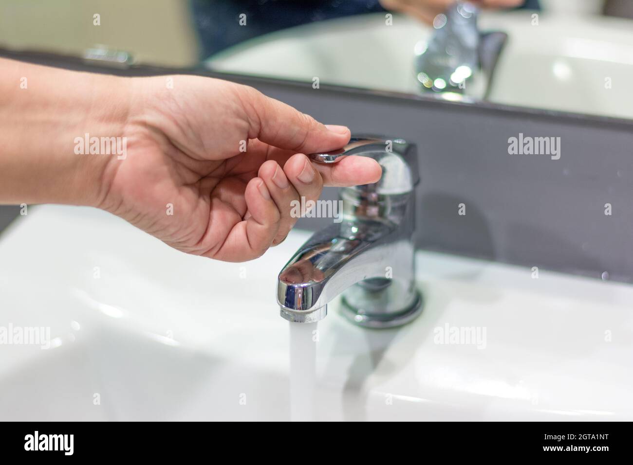 Men opening pipe hi-res stock photography and images - Alamy