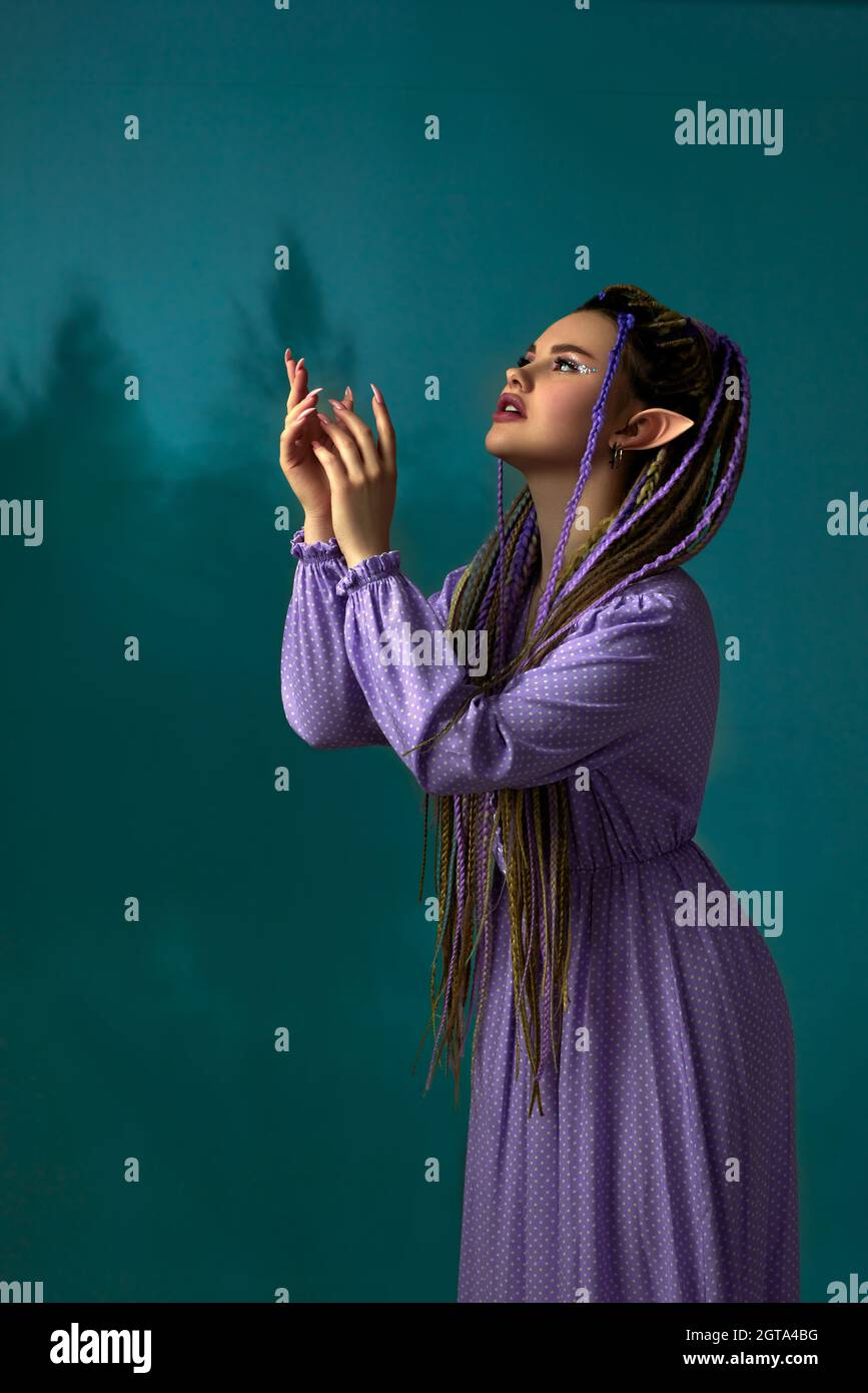 young and beautiful woman elf posing at camera Stock Photo - Alamy