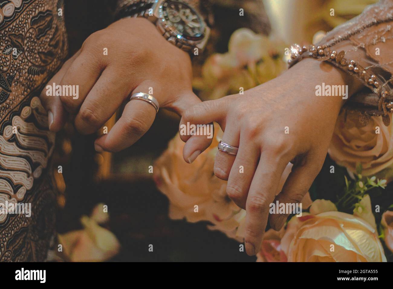 Finger hooking hi-res stock photography and images - Alamy