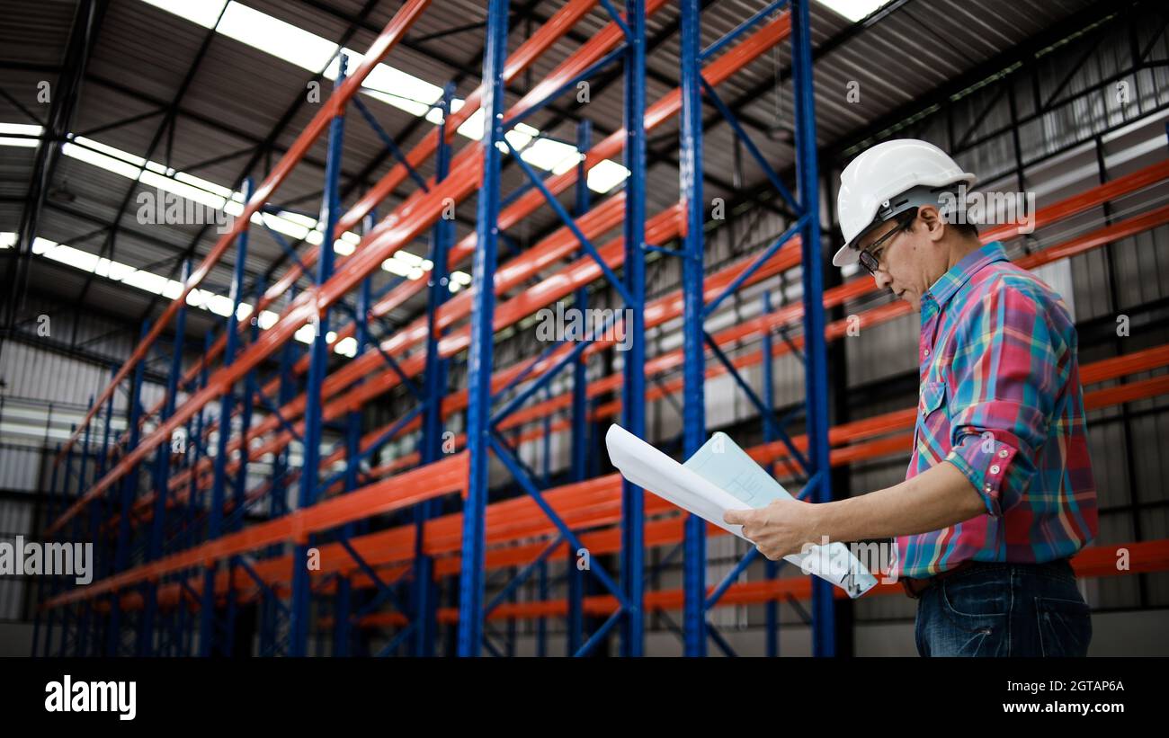Man Working In Warehouse Stock Photo - Alamy