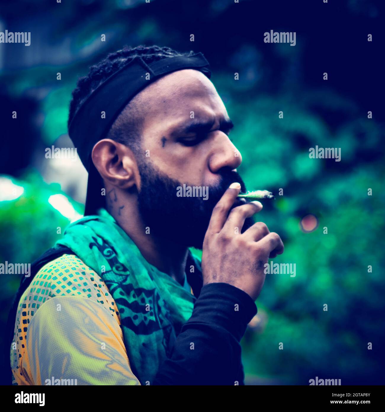 Man smoking marijuana at concert hi-res stock photography and images ...