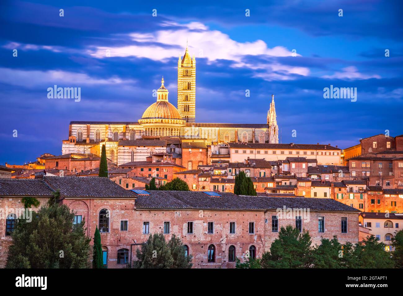 Siena, Italy. Night illuminated scenic Siena, a beautiful medieval town ...
