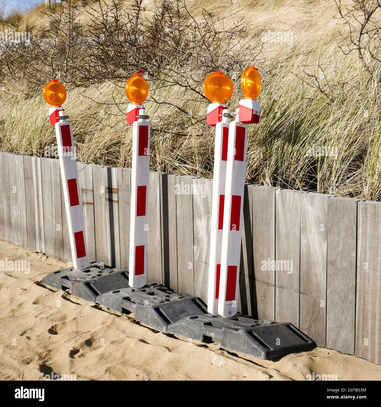 Leaning against barrier hi-res stock photography and images - Alamy