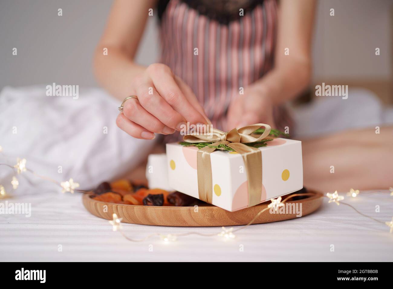 Unwrapping package hi-res stock photography and images - Alamy