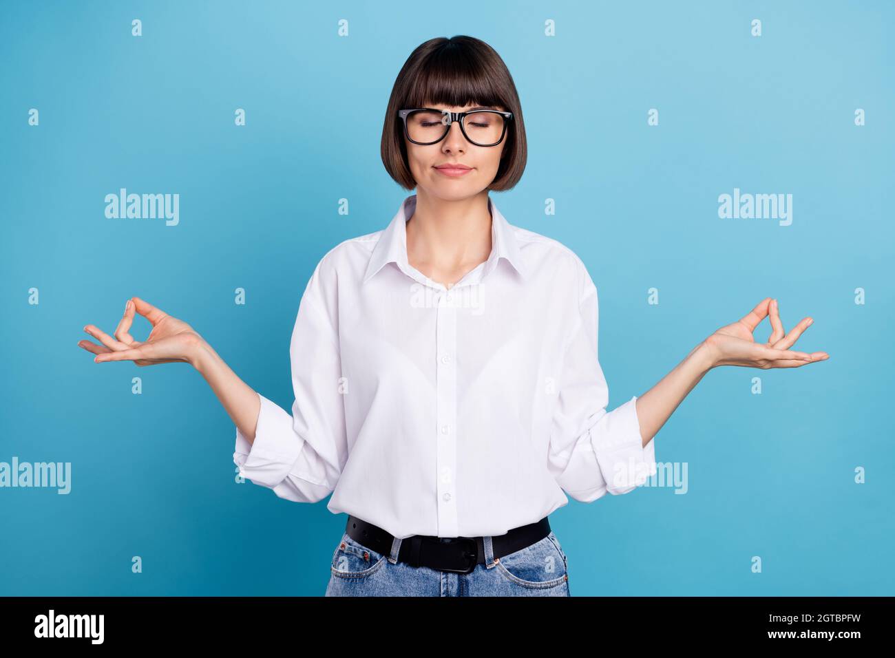 Portrait of attractive dreamy calm girl meditating hobby free time ...