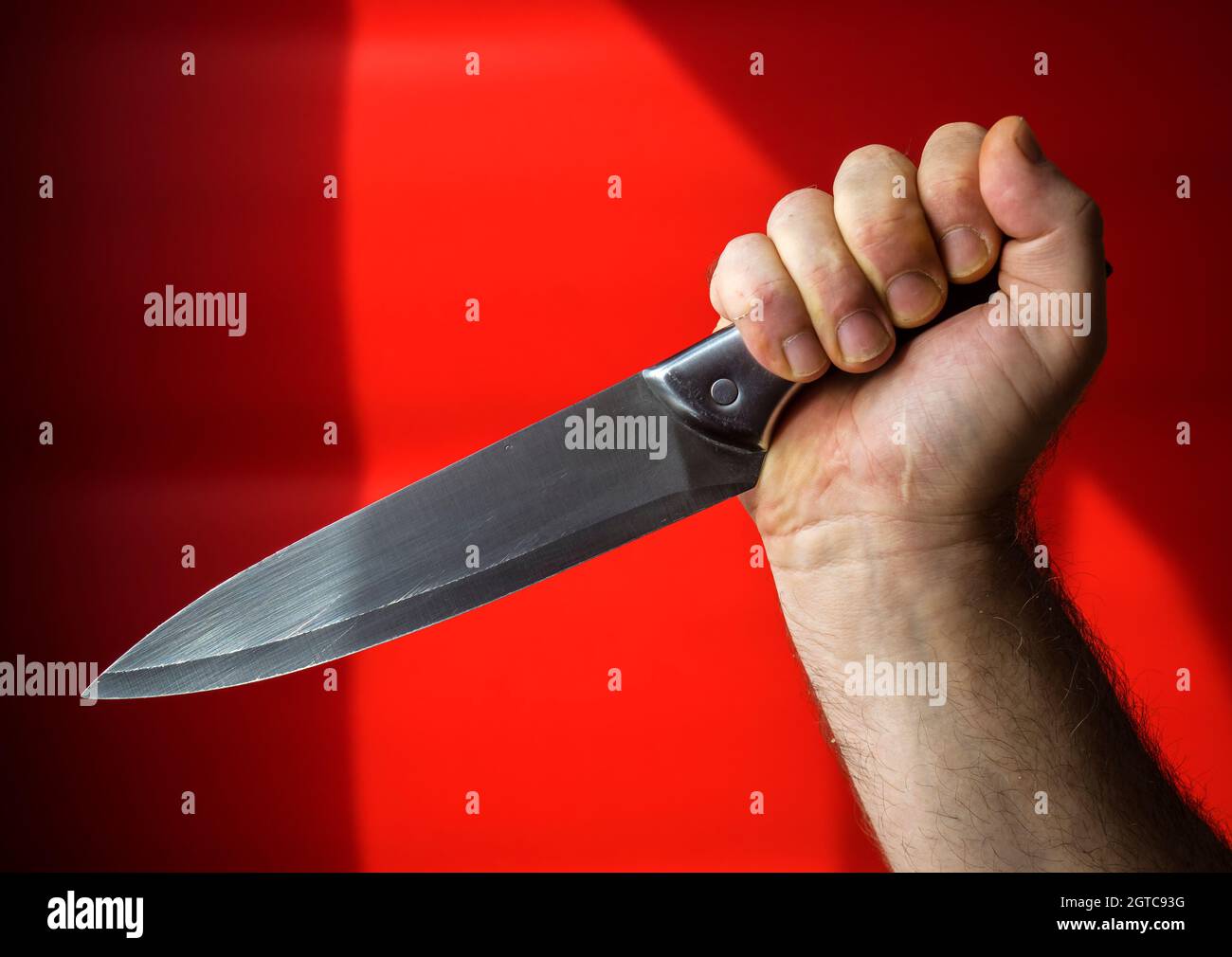 Hand gripping knife hi-res stock photography and images - Alamy