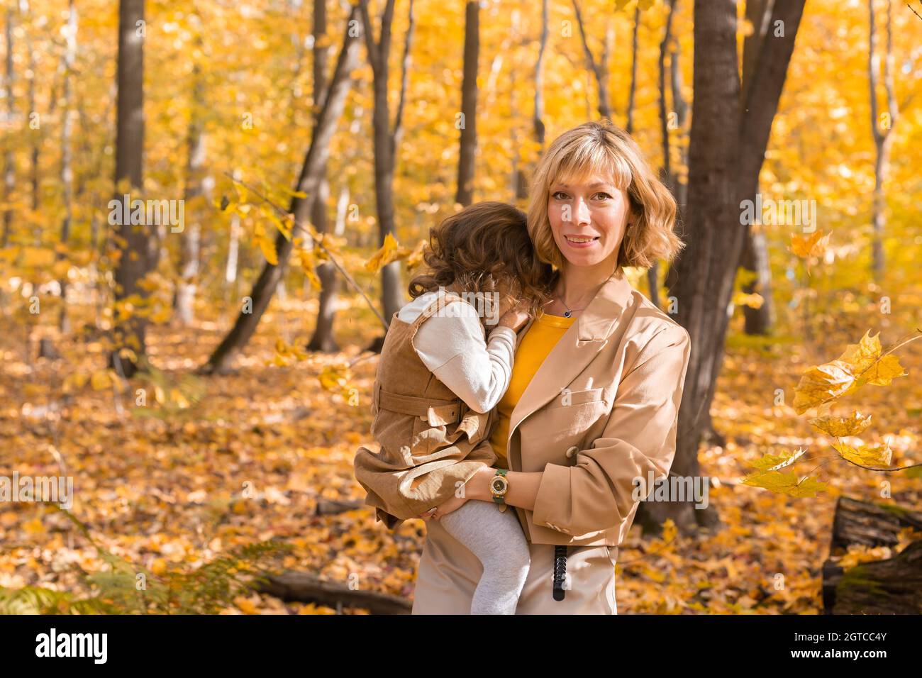 Mother comforting her crying little girl - parenthood concept Stock ...