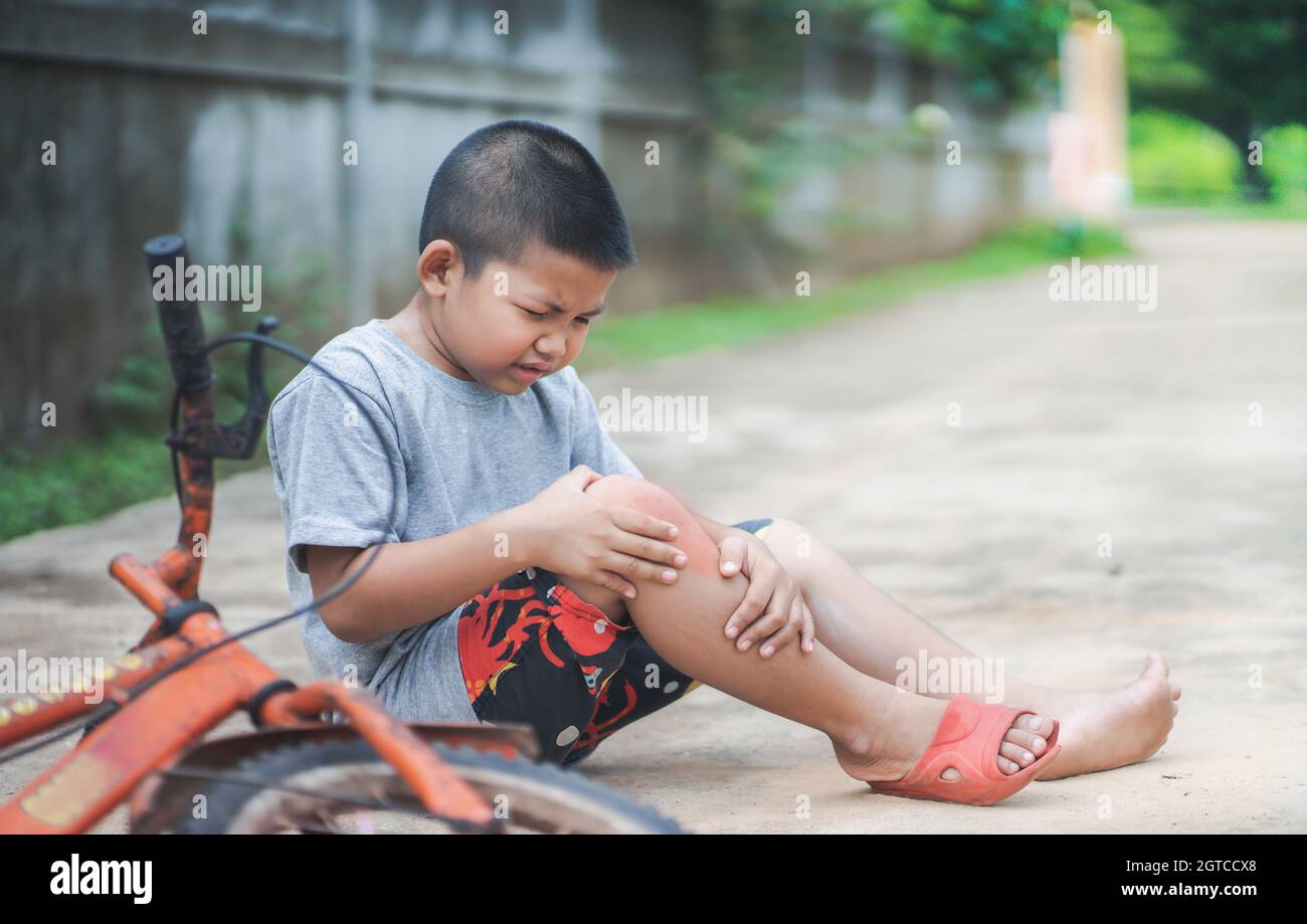 Boy fell of his bike hi-res stock photography and images - Alamy